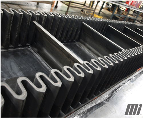 Cleat Design and Belt Fabric Selection - Rock Products Magazine